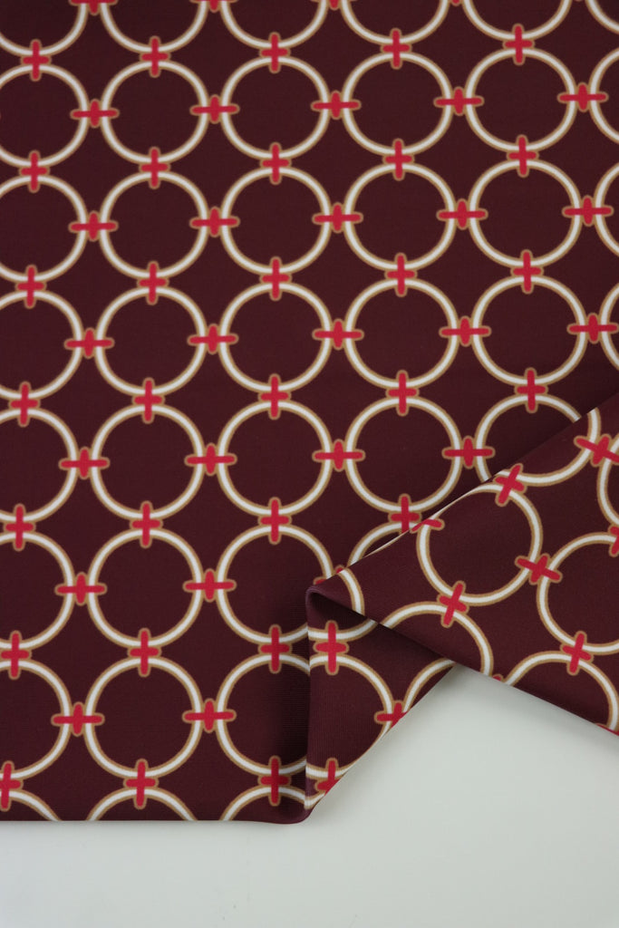 White Rings on Maroon Nylon Spandex Tricot | Designer Deadstock | Surge ...